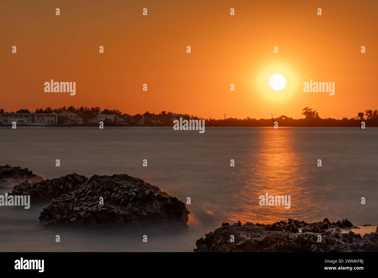 Orange sunset at Siesta Key beach with sunshine, Sarasota, Florida ...