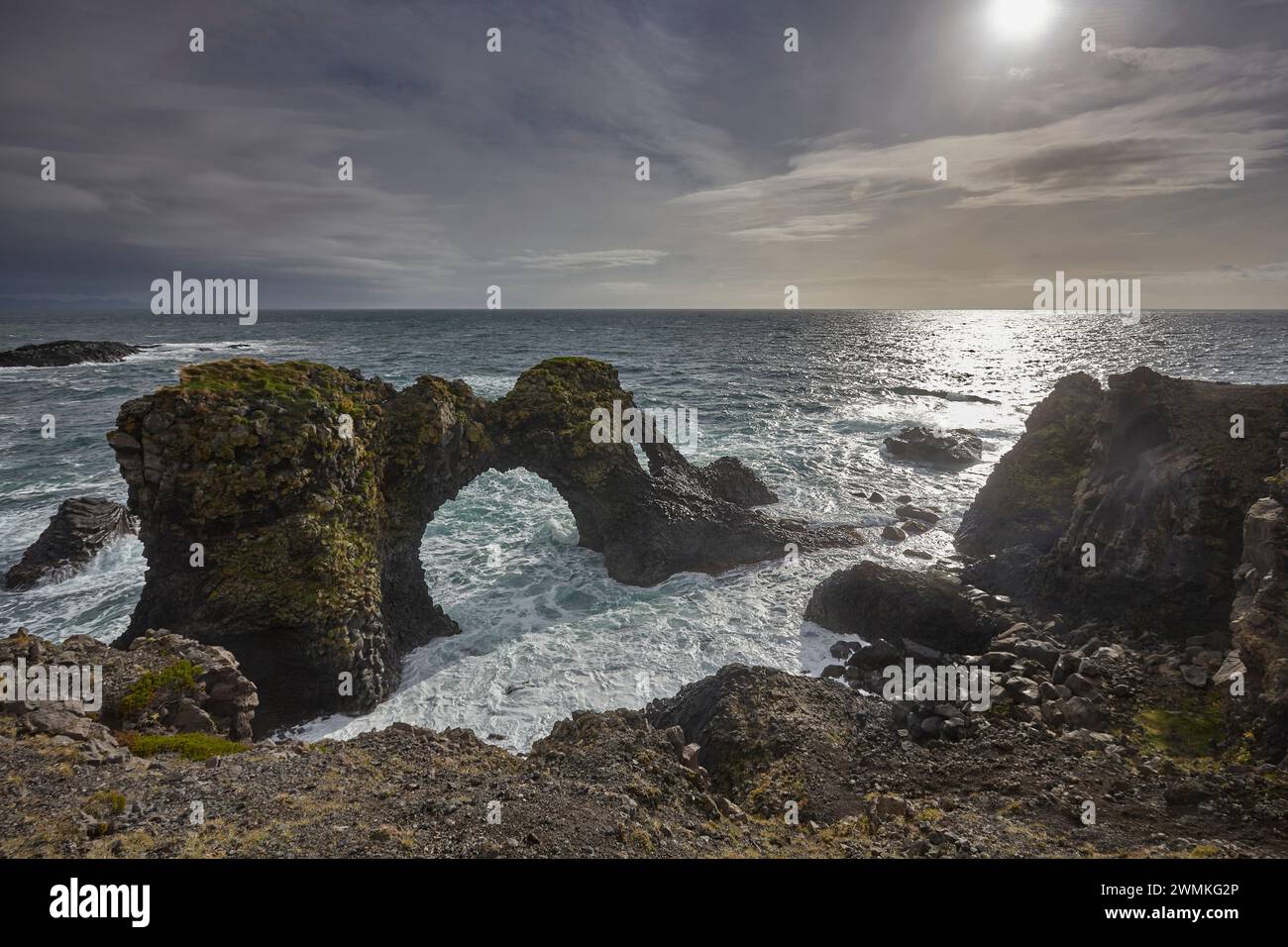Lava cliffs along the seashore at Arnastapi, Snaefellsnes peninsula, on ...