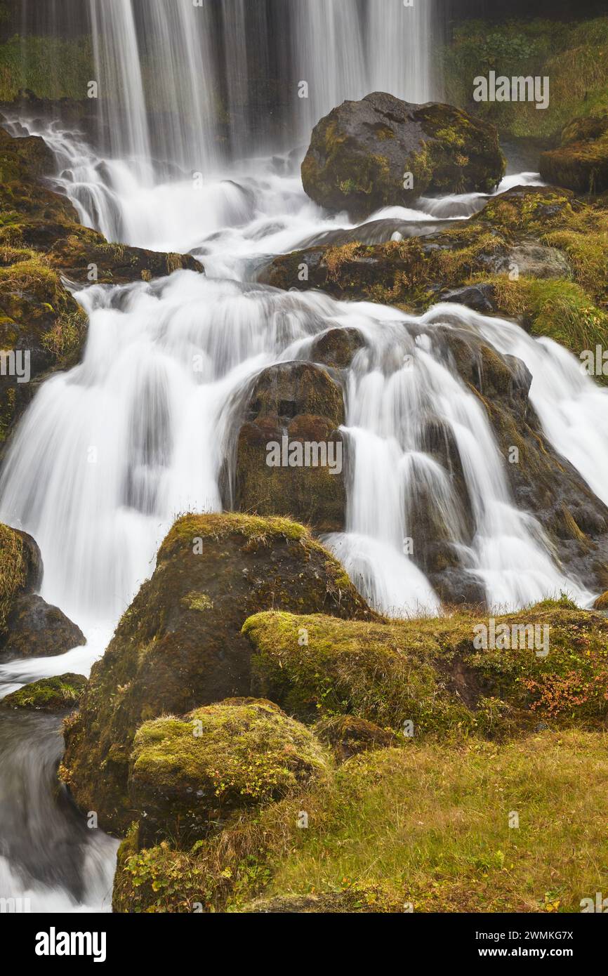 Moss covered rock and the rugged beauty of Hafrafell waterfall in ...