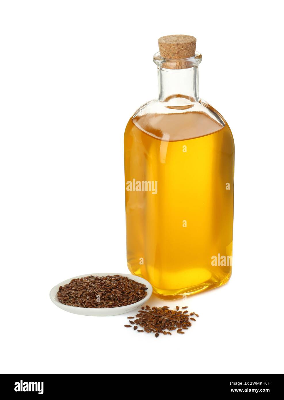 Vegetable fats. Flax oil in glass bottle and seeds isolated on white ...