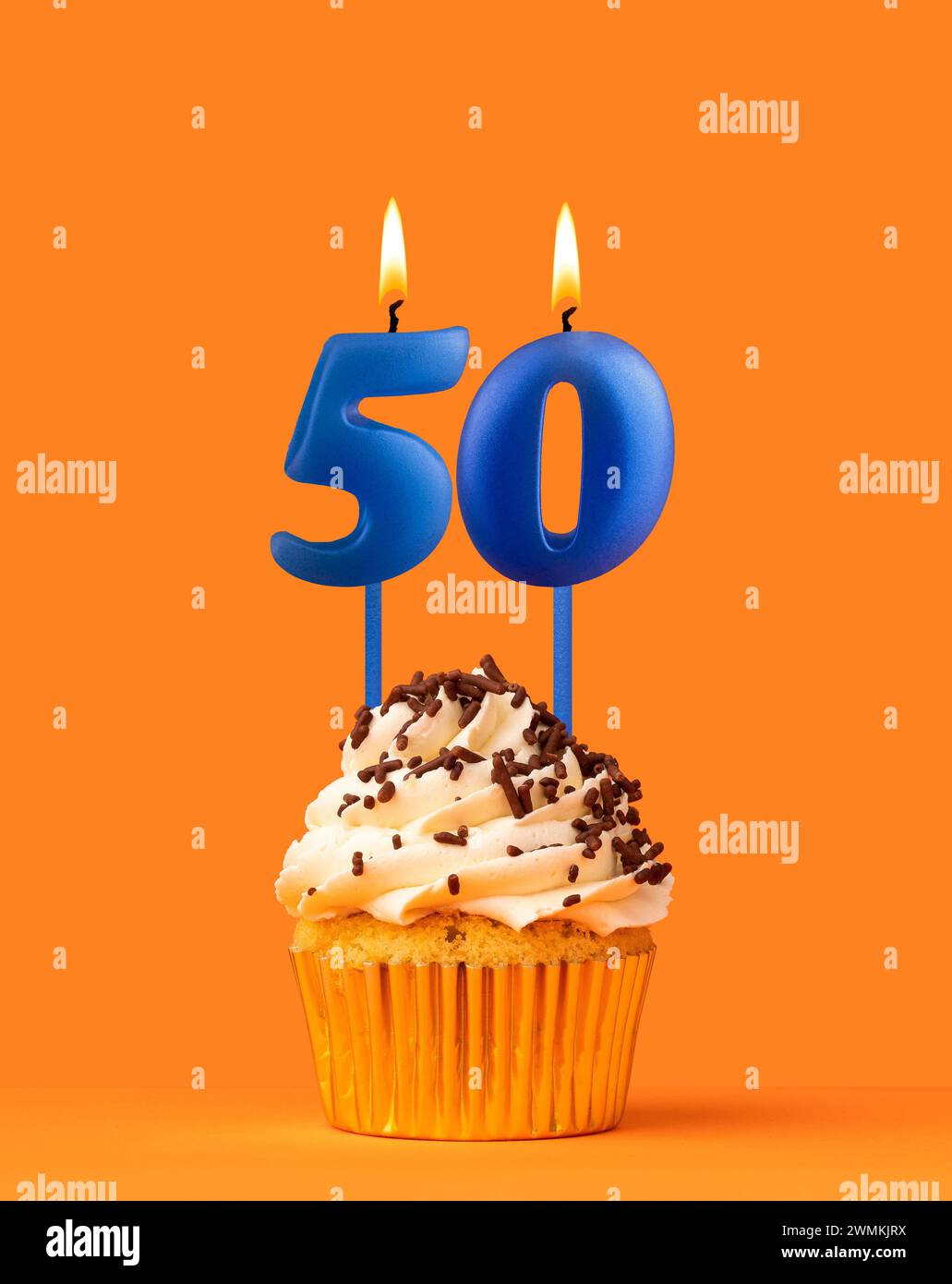 Birthday cake with burning candle number 50 hi-res stock photography ...