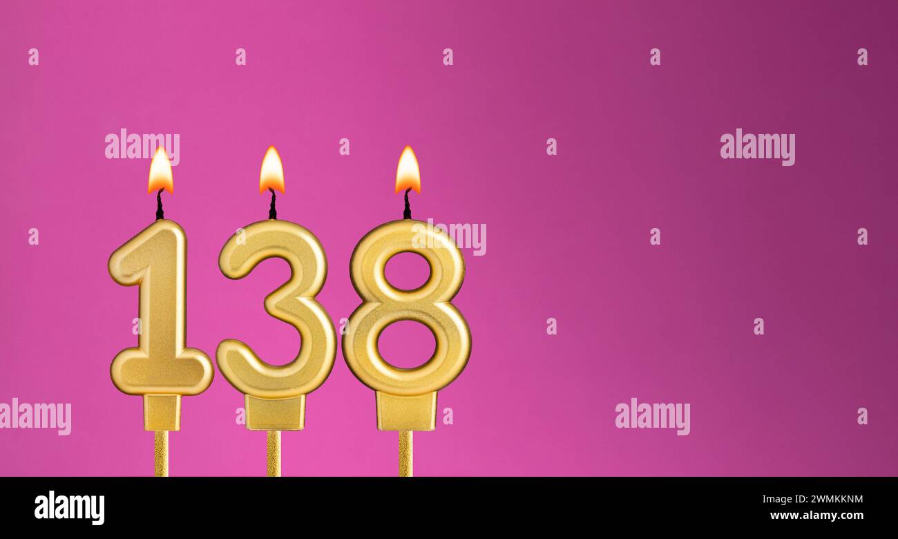 Candle number 138 in purple background - birthday card Stock Photo - Alamy