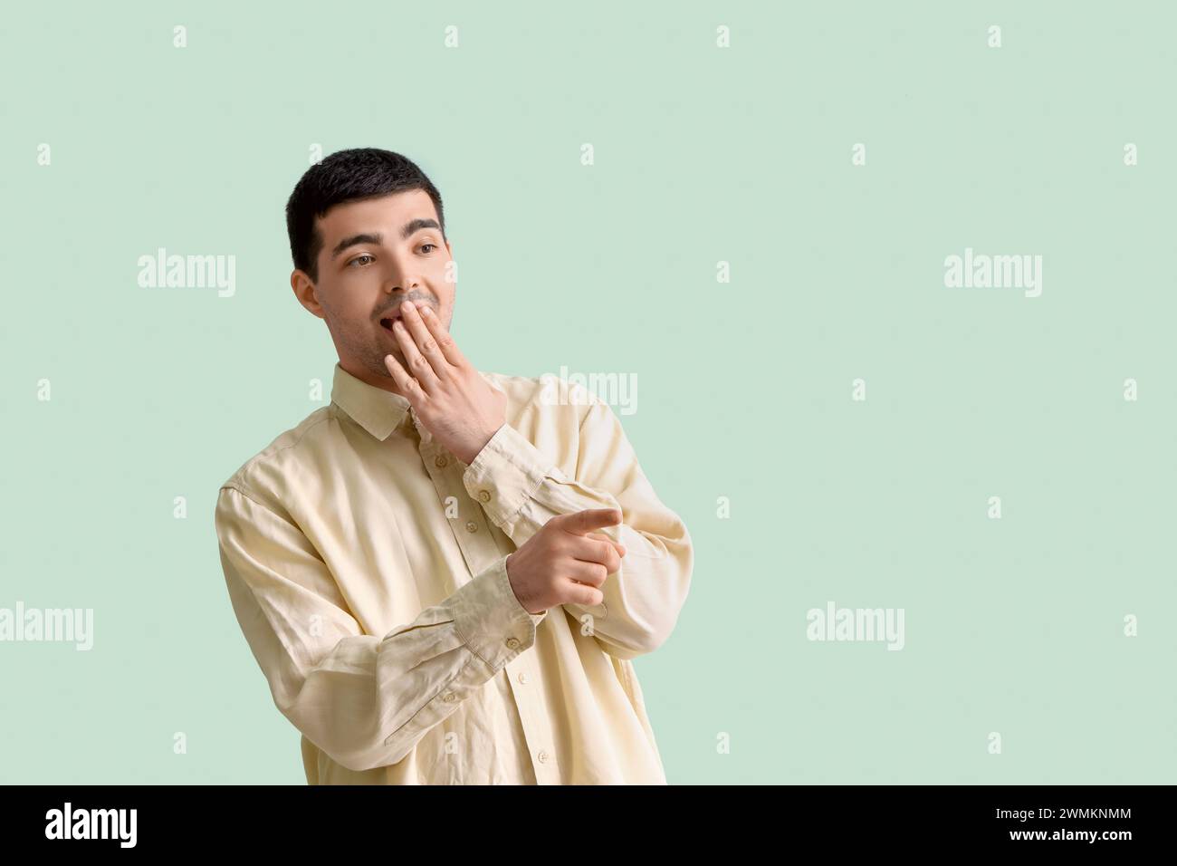 Surprised man pointing text hi-res stock photography and images - Alamy