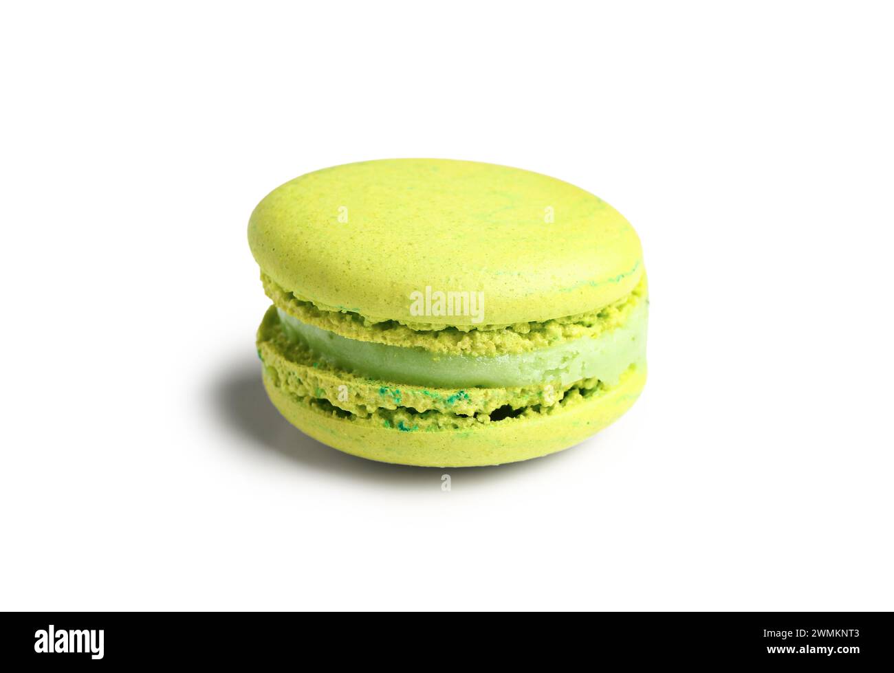 Sweet green macaroon on white background Stock Photo - Alamy