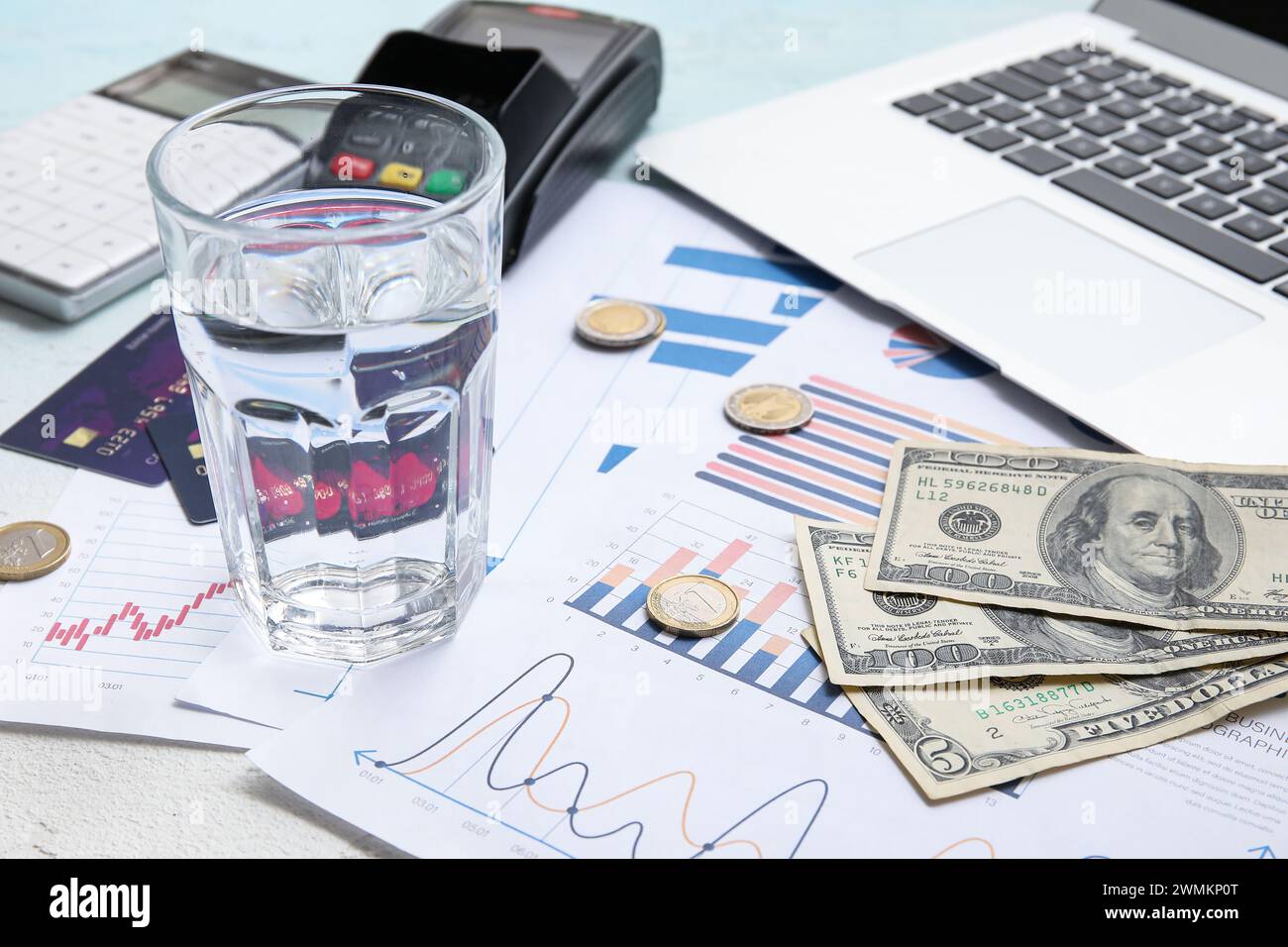 Glass water charts money hi-res stock photography and images - Alamy