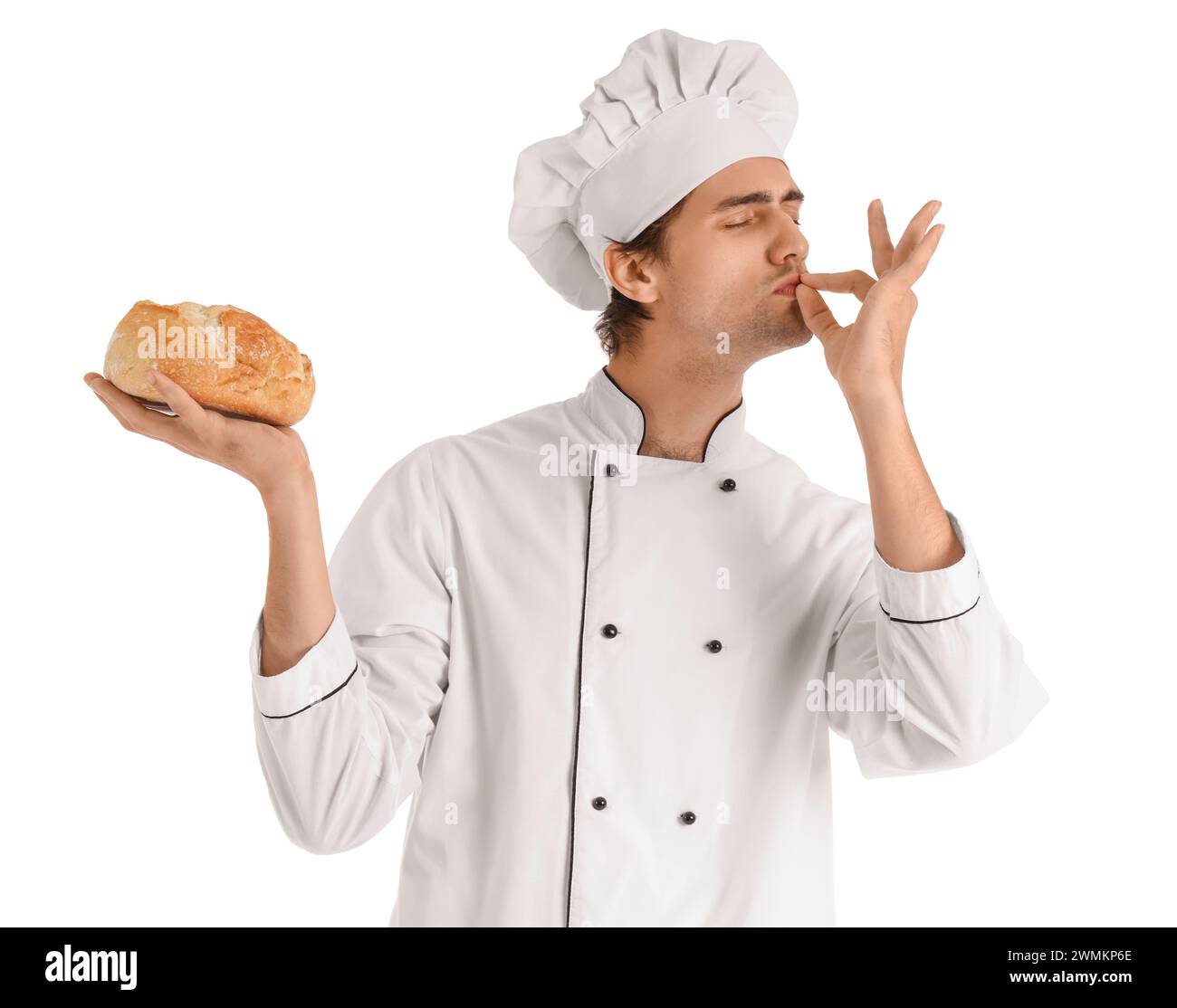 Handsome young chef with fresh bread showing perfect gesture on white ...