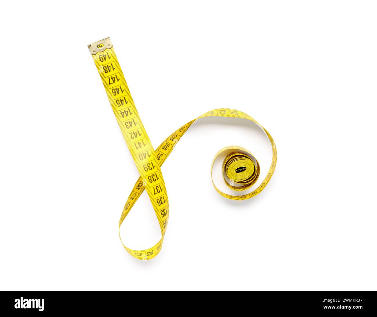 Yellow measuring tape on white background Stock Photo - Alamy