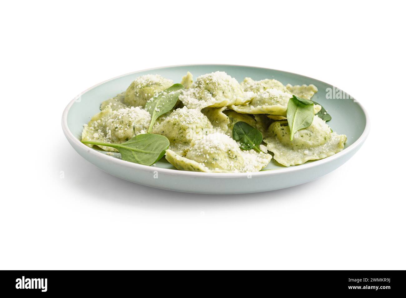 Plate of tasty ravioli with spinach and cheese on white background ...
