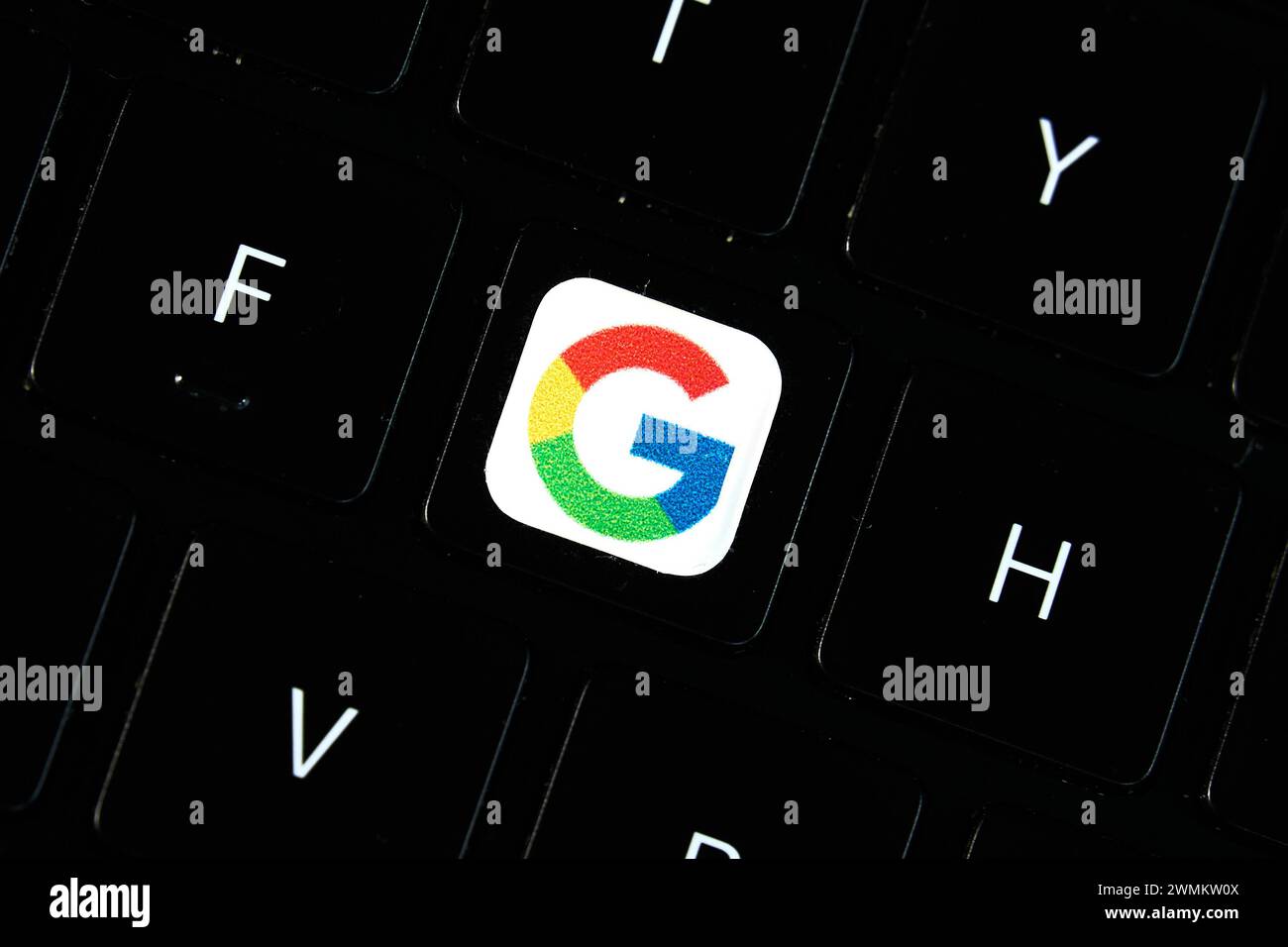 Dallas, TX USA - February 24, 2024: Google colorful G letter on a key ...