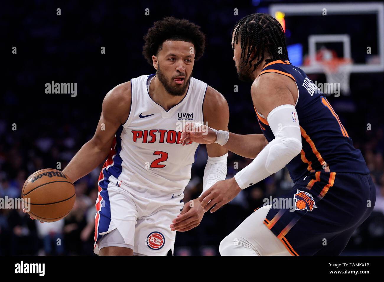 Detroit Pistons guard Cade Cunningham (2) drives against New York Knicks guard Jalen Brunson ...