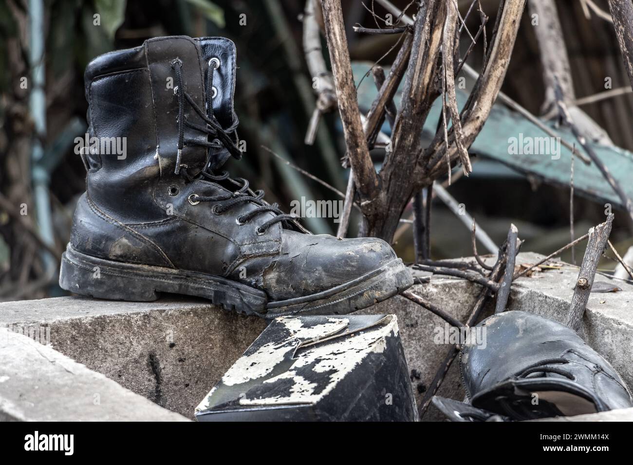 Old shoes on the street Stock Photo - Alamy