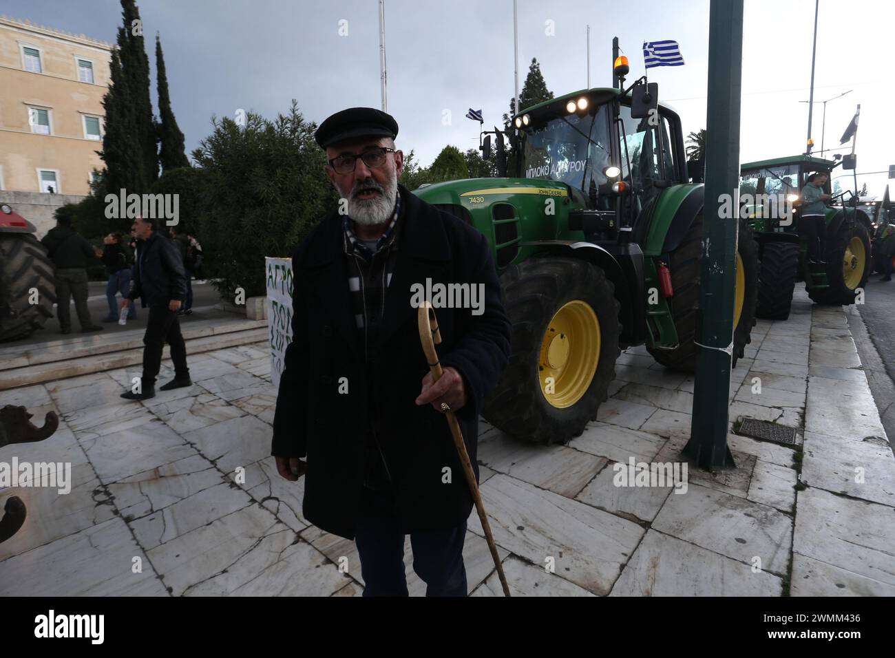 Greek farmers protest outside the Greek Parliament with their tractors ...