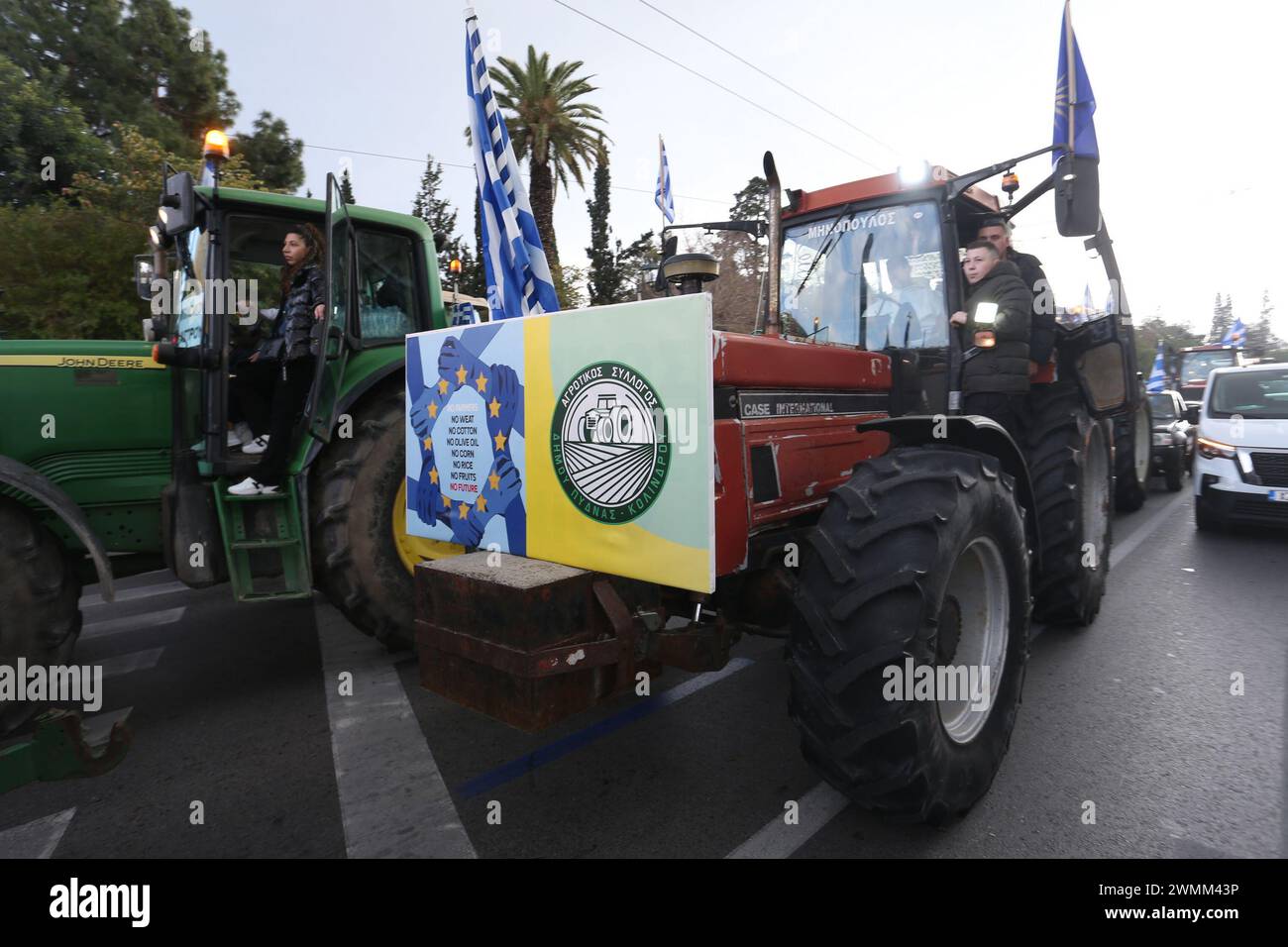 Greek farmers protest outside the Greek Parliament with their tractors ...