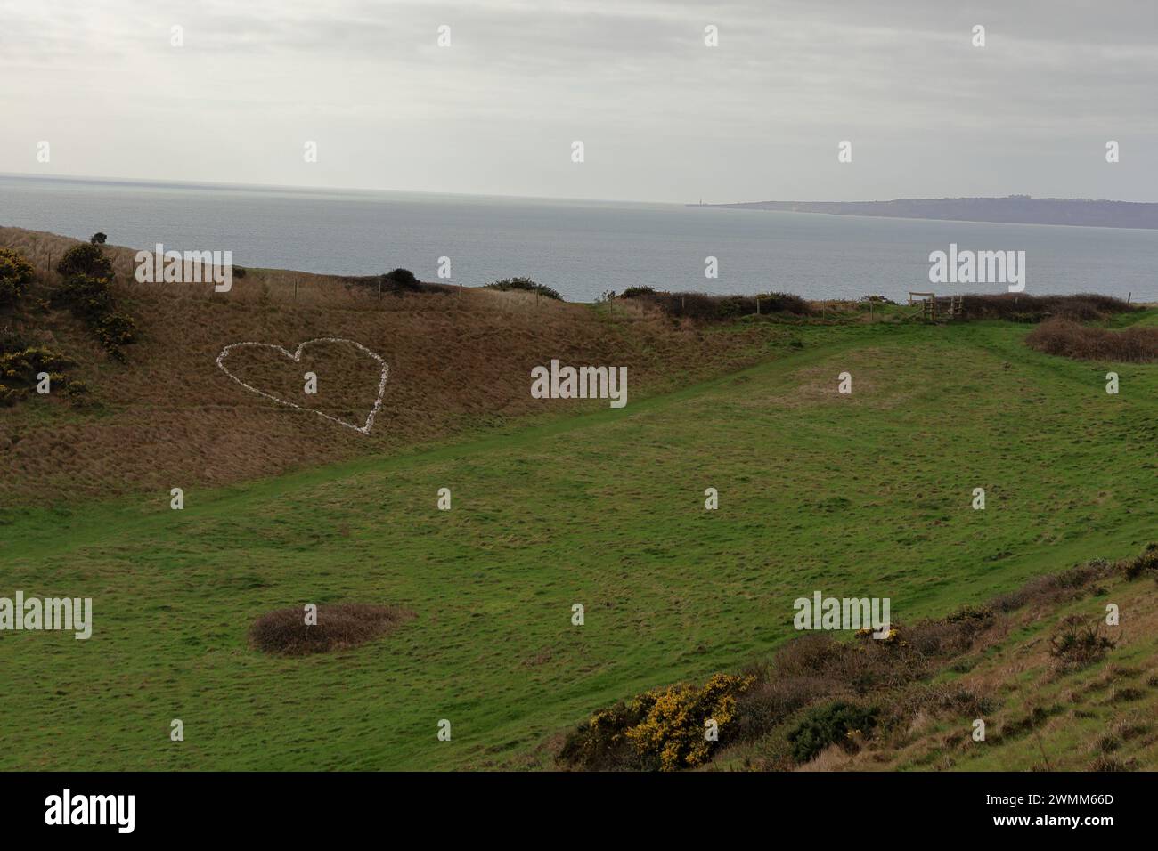 Lulworth Cove SW coastal path - Heart in Cliff Stock Photo - Alamy