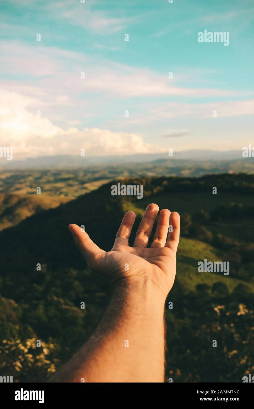 Hand Reaching Out Stock Photo - Alamy