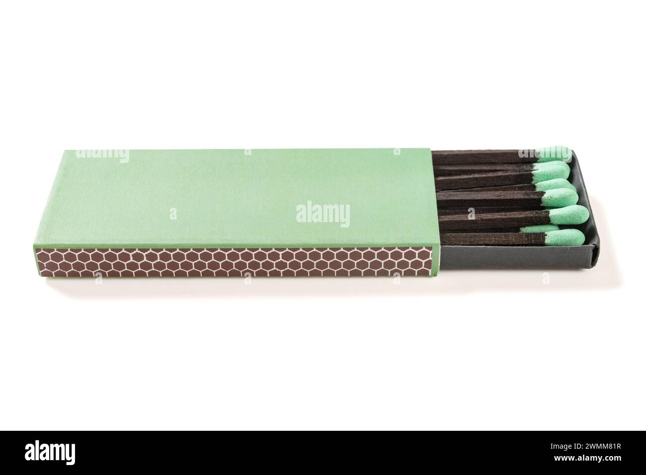 angle view green matchbox on a white background at horizontal ...