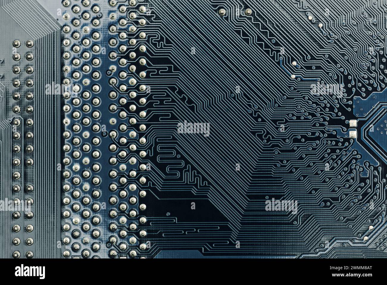 circuit board connections. back side of computer mother board. high ...