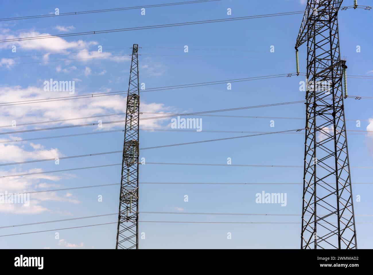 High voltage towers with sky background. Power line support with wires ...