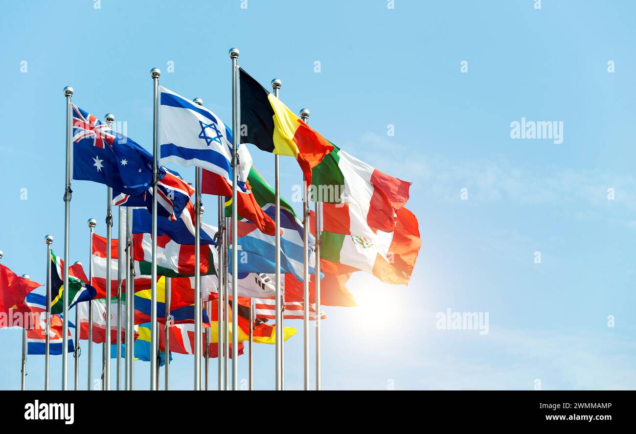 Set of flags fluttering in the wind against blue sky background Stock ...