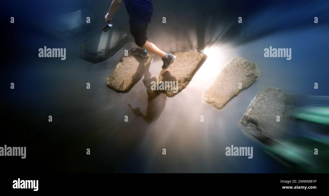 Person stepping stones top hi-res stock photography and images - Alamy