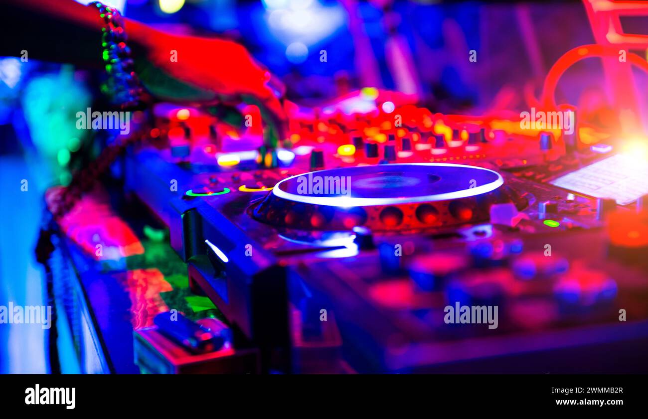Dj mixing at nightclubs and music festivals Stock Photo - Alamy