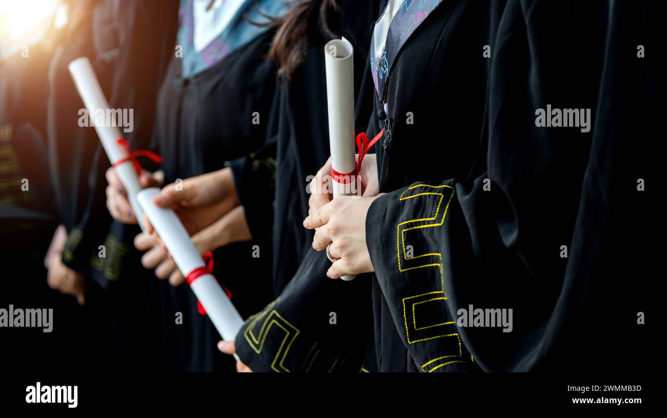 Students holding certificate hi-res stock photography and images - Alamy