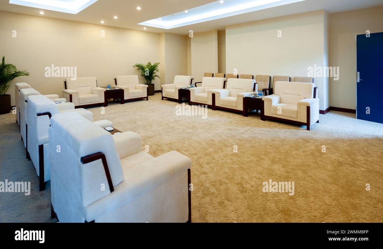 Empty reception room in a hotel Stock Photo - Alamy