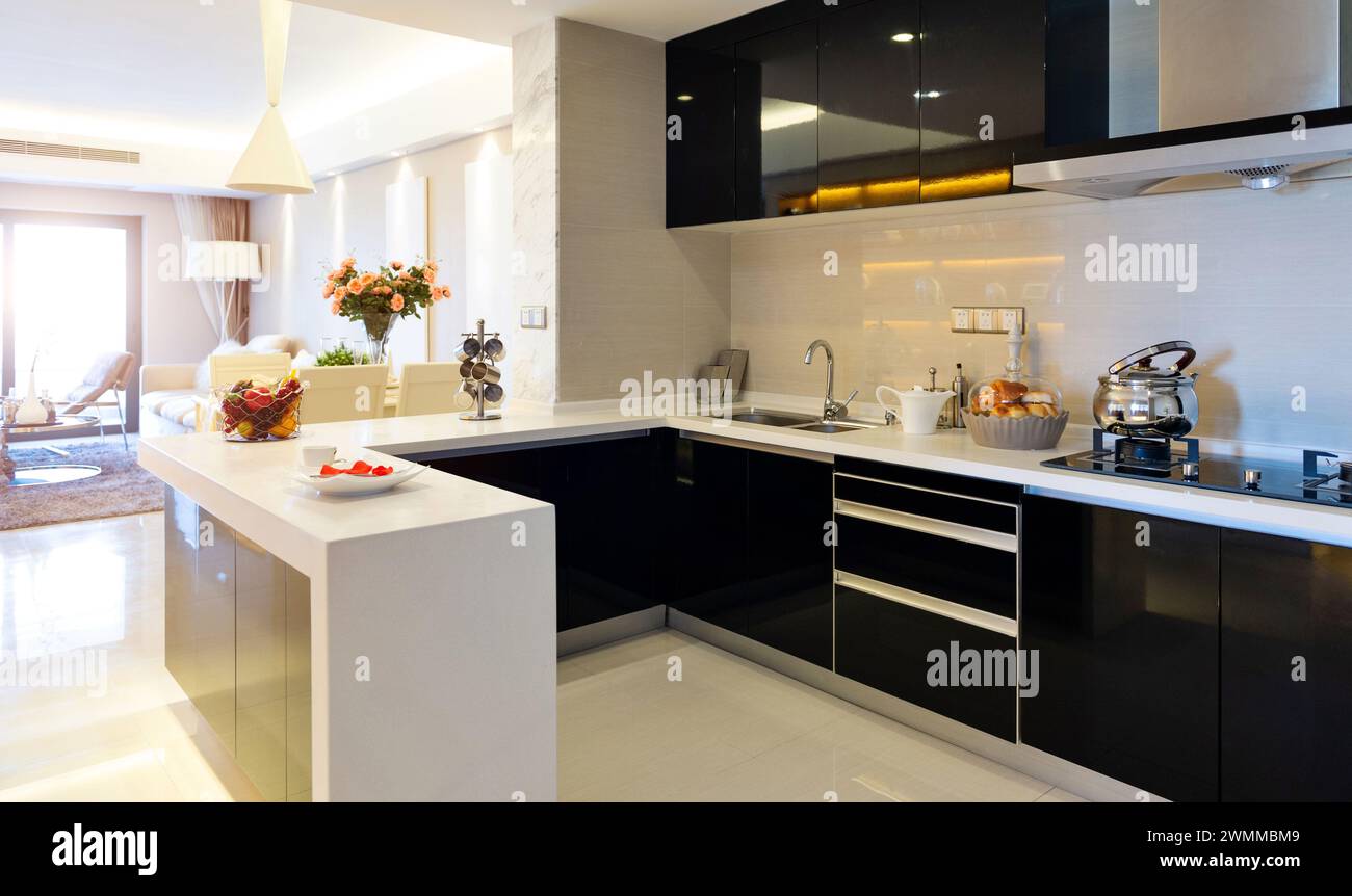 Clean modern kitchen in modern home Stock Photo - Alamy