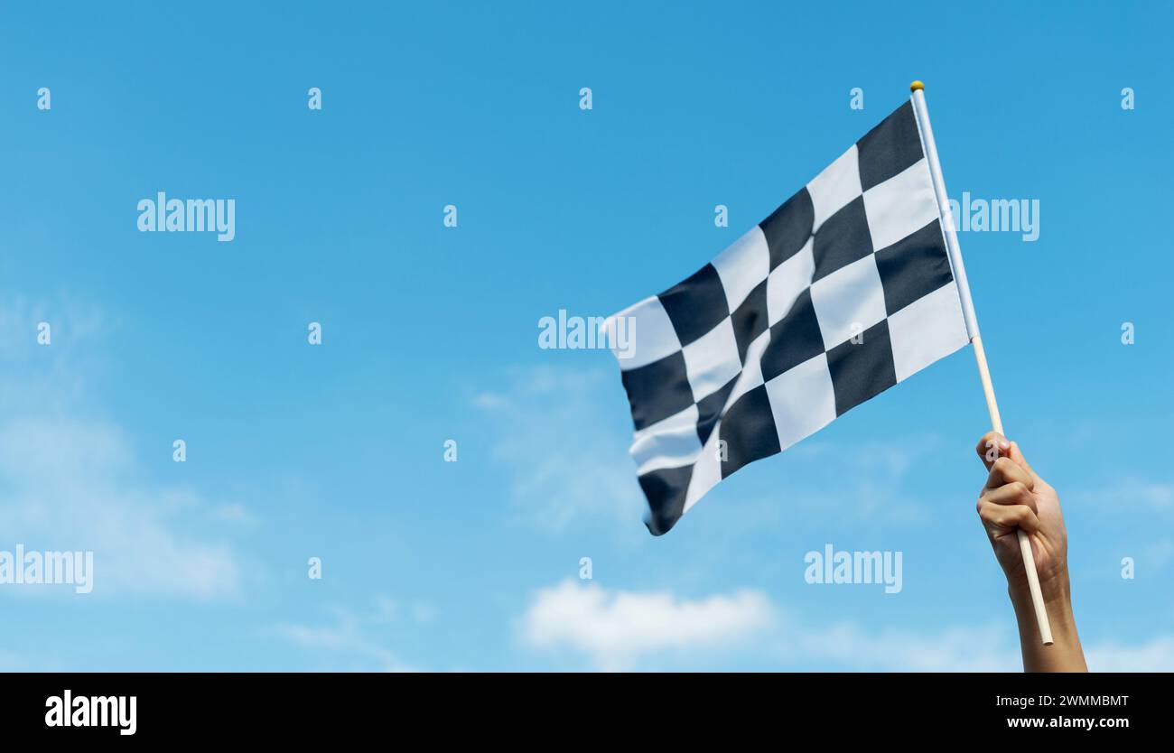 Hand waving finish flag hi-res stock photography and images - Alamy