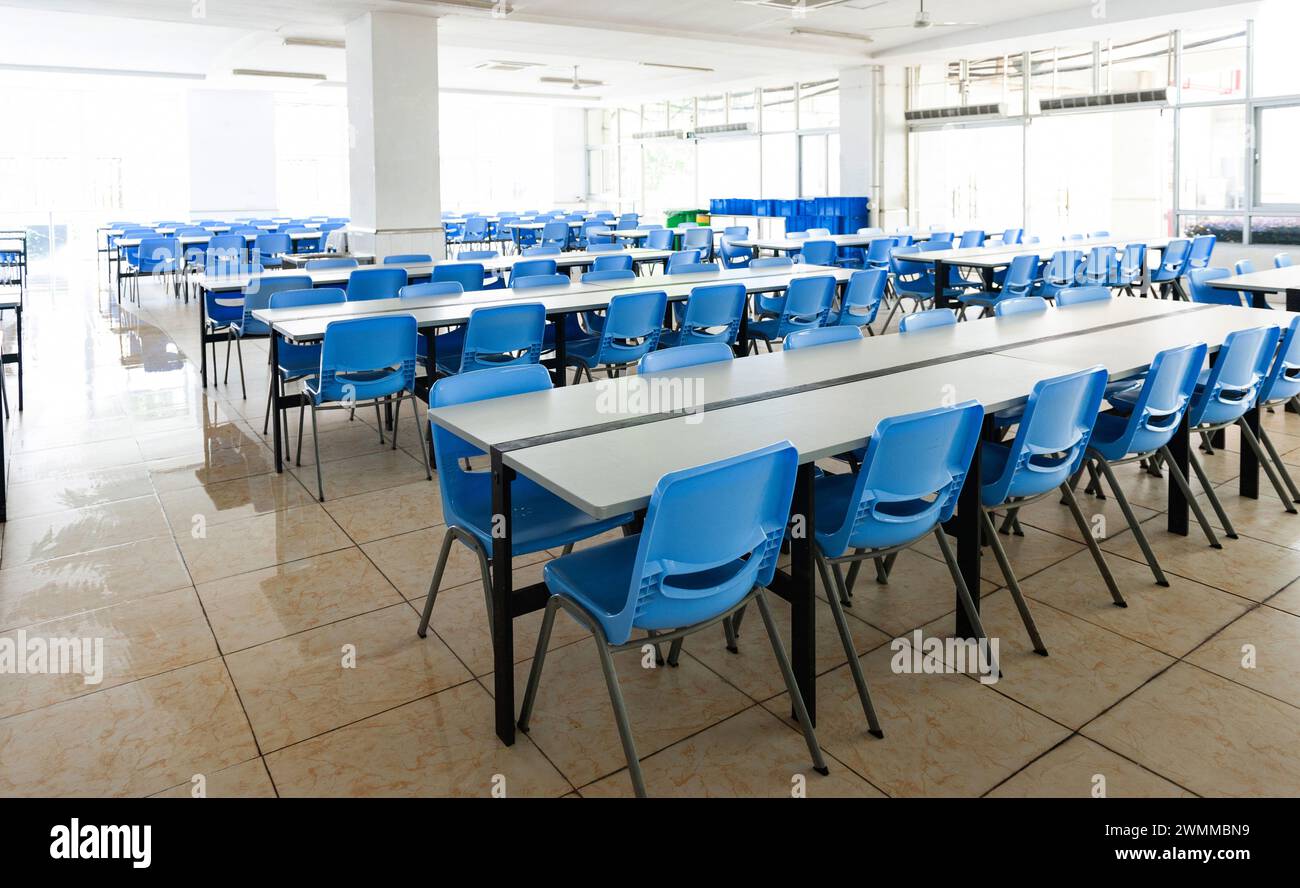 Clean school cafeteria with empty seats and tables Stock Photo - Alamy