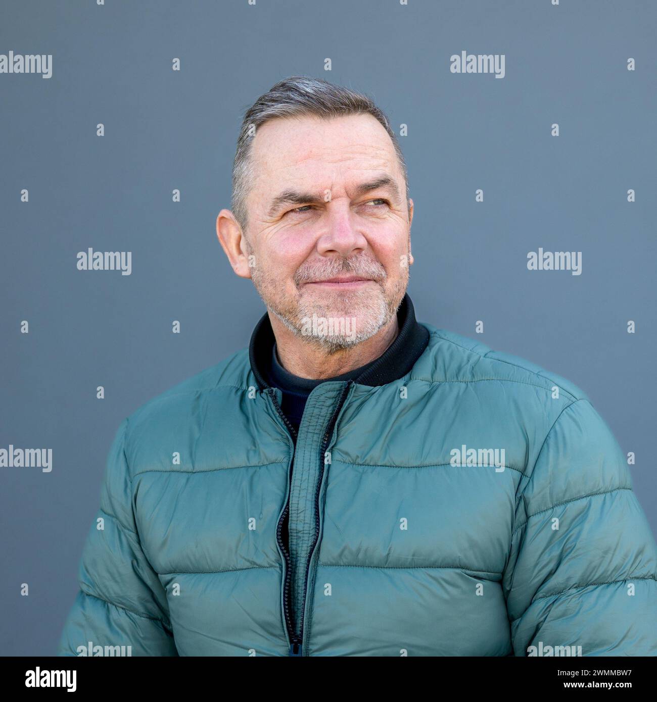 Old man wearing blue coat hi-res stock photography and images - Alamy