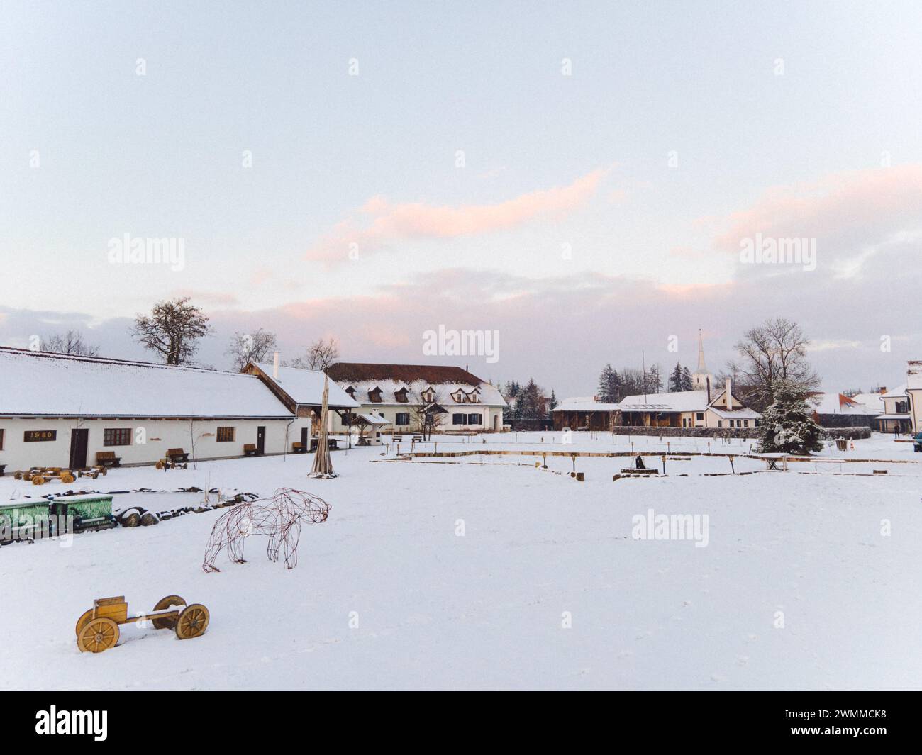 Winter scene of a snowy farm with buildings Stock Photo - Alamy