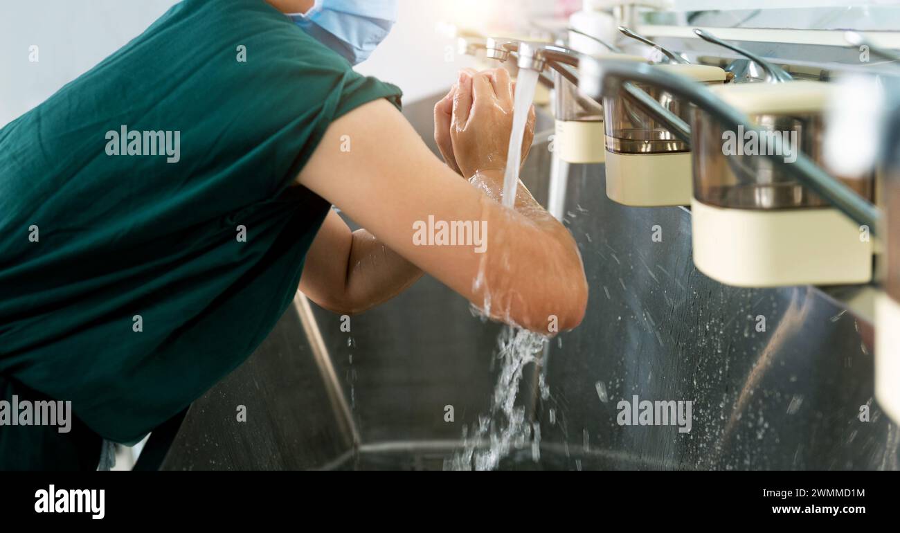 Young female doctor washing hands before operation Stock Photo - Alamy