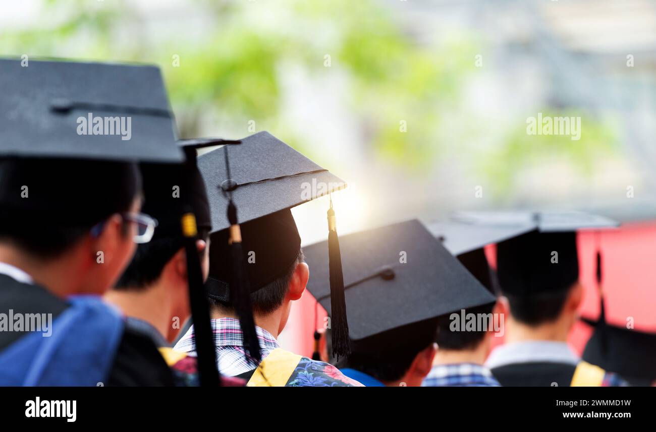 Back view of graduates during commencement Stock Photo - Alamy