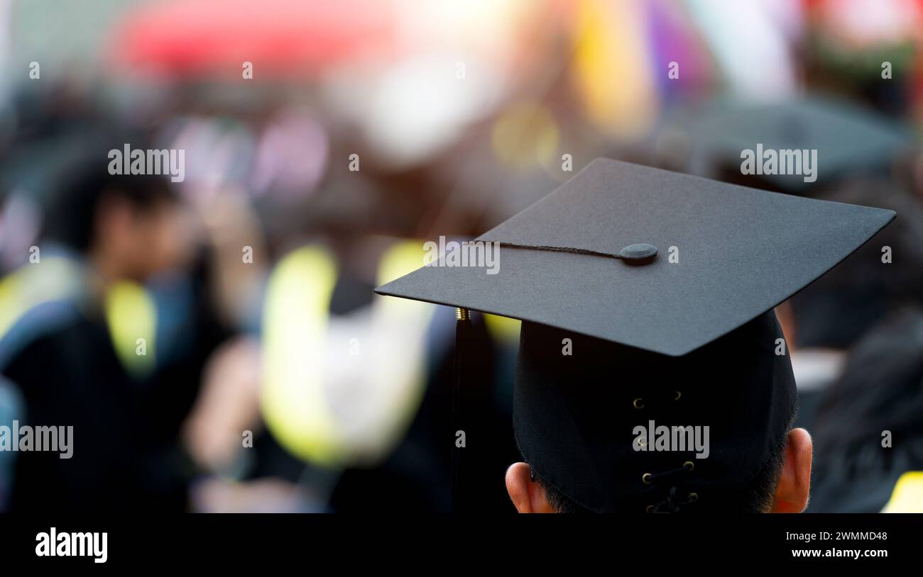 Back view of graduates during commencement Stock Photo - Alamy