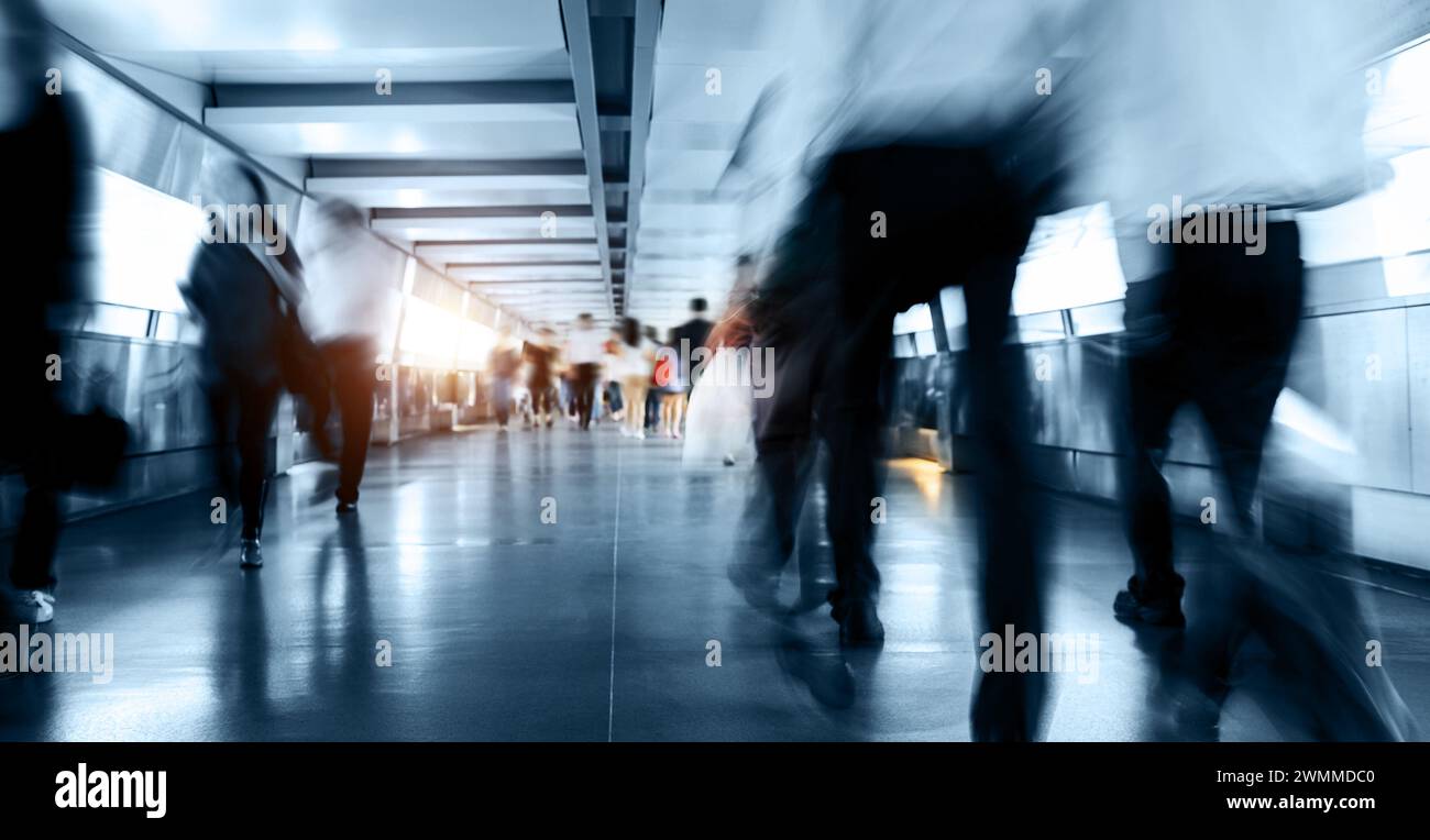 Business people rushing in the lobby Stock Photo - Alamy