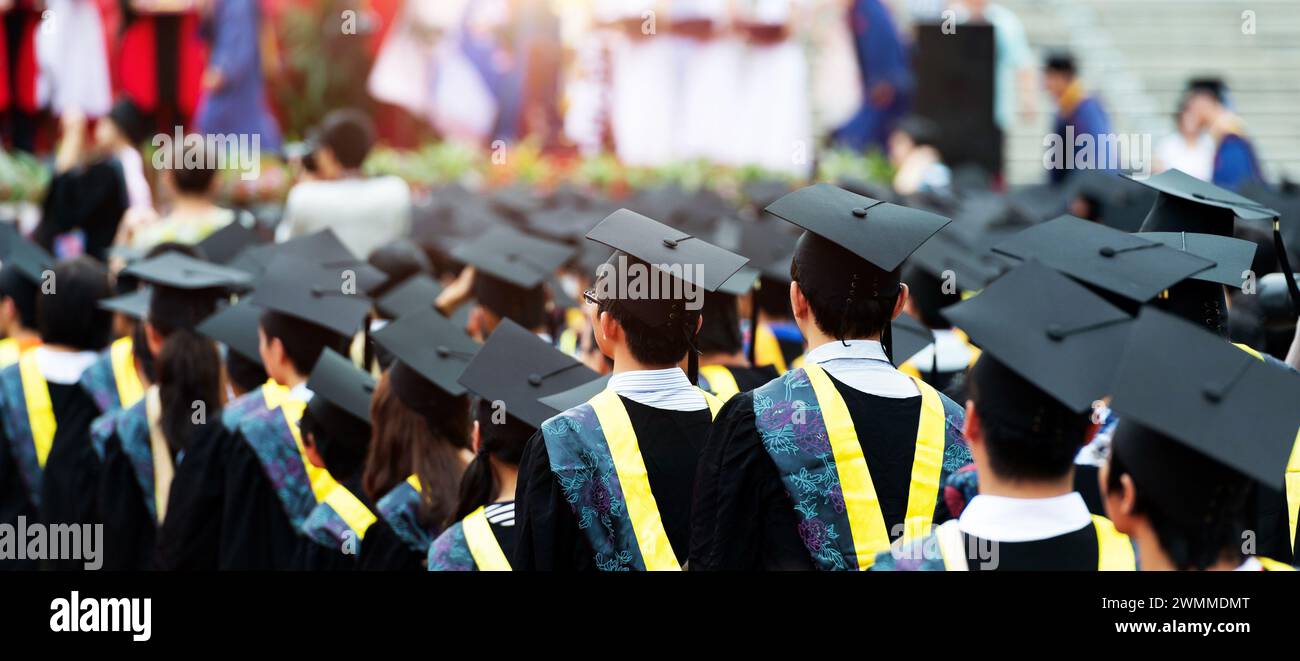 Rear view of graduates during commencement Stock Photo - Alamy
