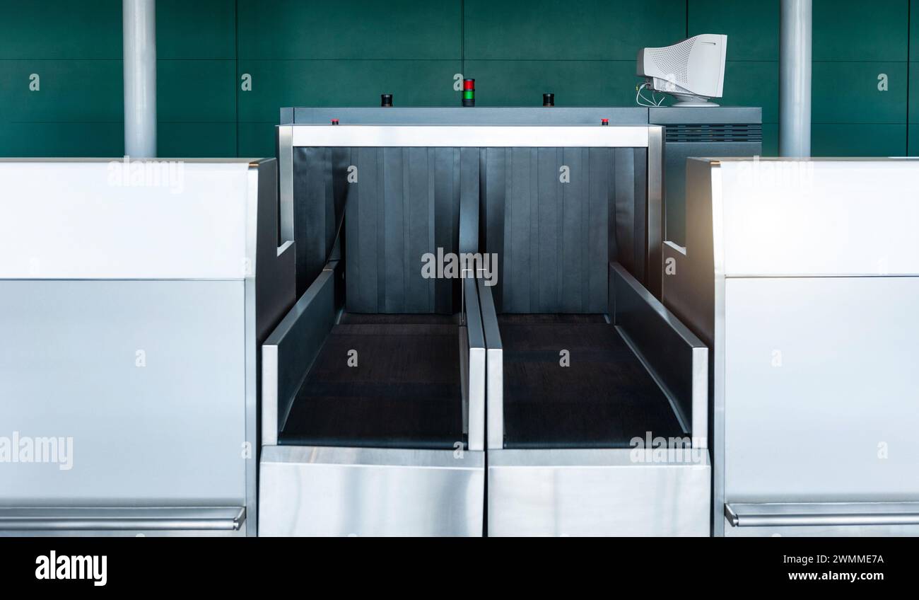 X-ray machine at the airport check in counter Stock Photo - Alamy