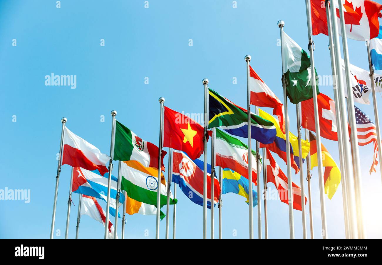 Set of flags fluttering in the wind against blue sky background Stock ...