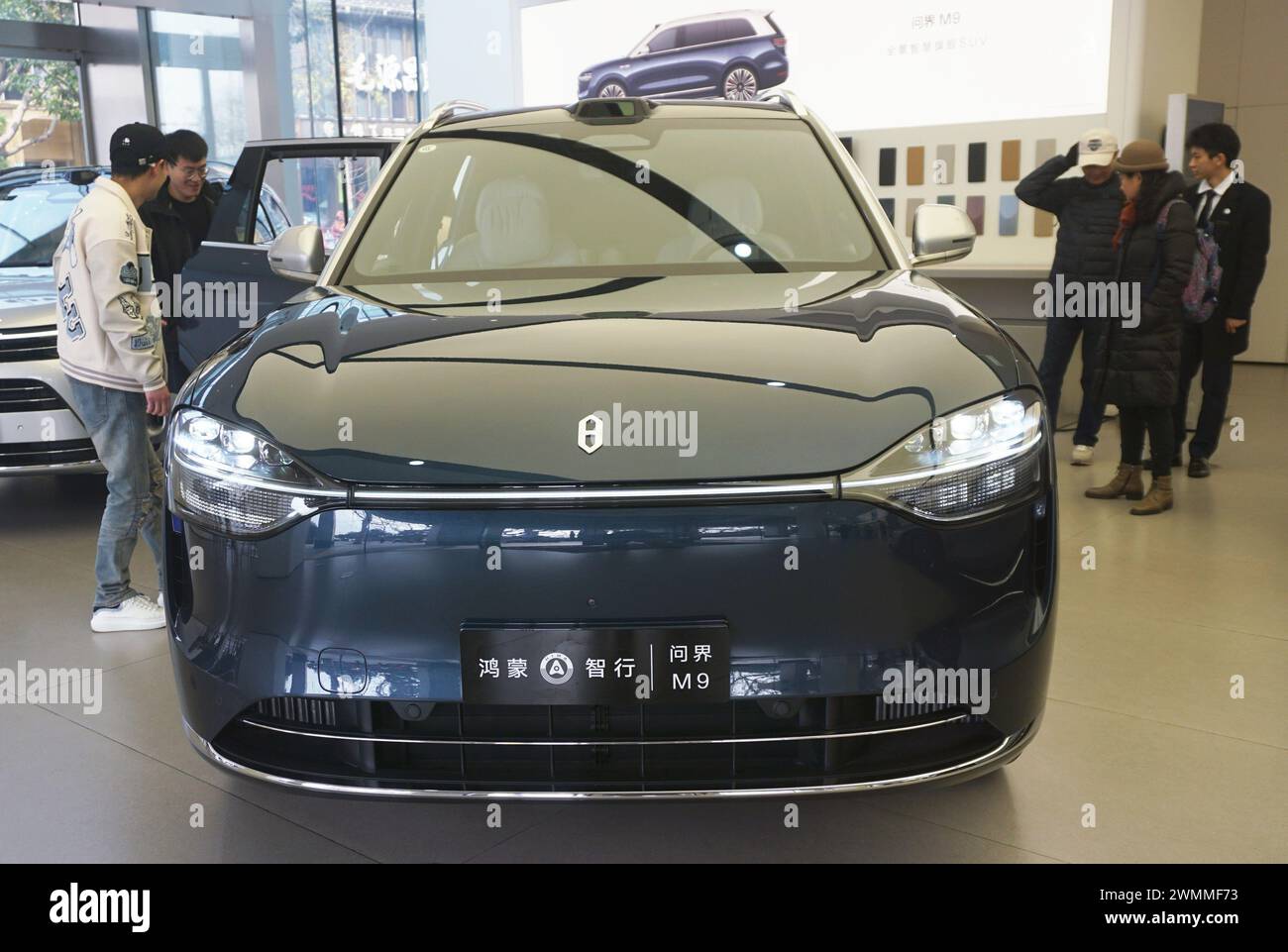 HANGZHOU, CHINA - FEBRUARY 27, 2024 - Customers experience an AITO M9 ...