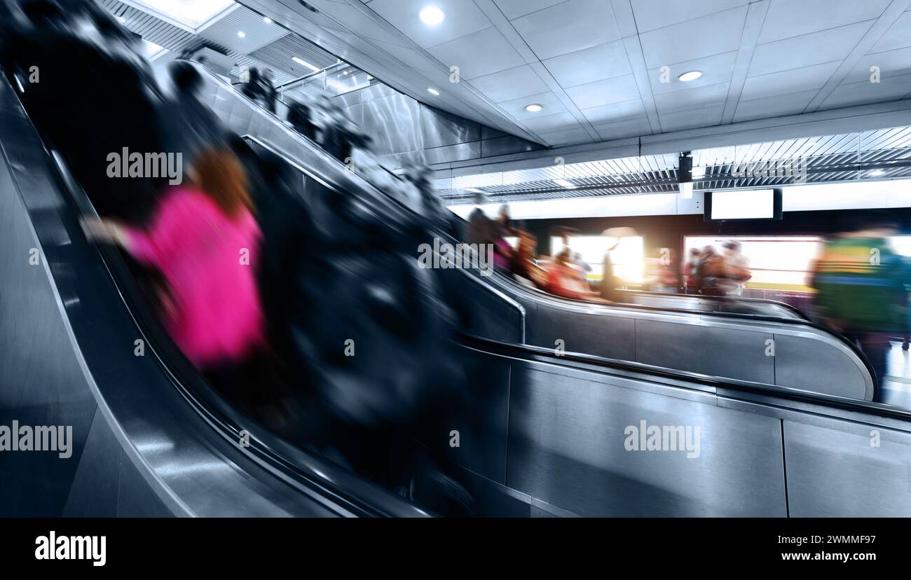 Crowded people on escalator in hi-res stock photography and images - Alamy