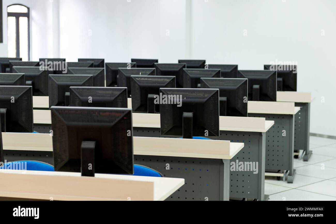 Group of computers in computer lab Stock Photo - Alamy