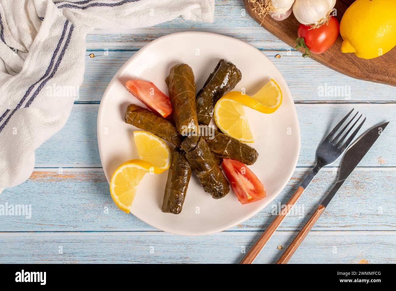 Stuffed grape leaves with olive oil. Appetizer dishes. Stuffed stuffed ...