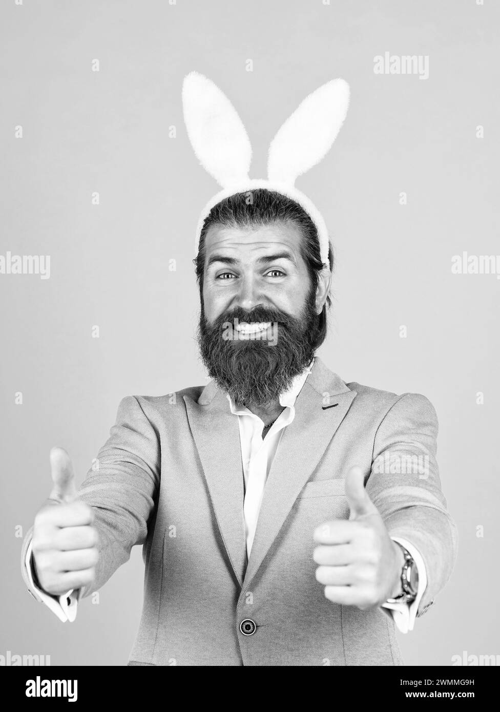 symbol of perfection. funny bearded hipster in bunny ears. celebration ...