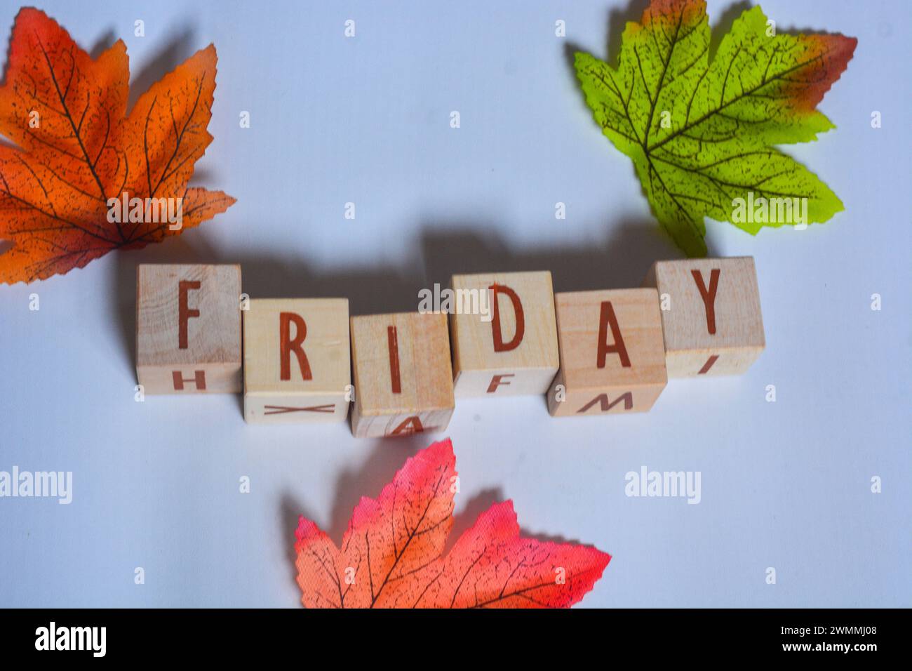 English vocabulary "FRIDAY" with medium brown wooden blocks, pink and ...