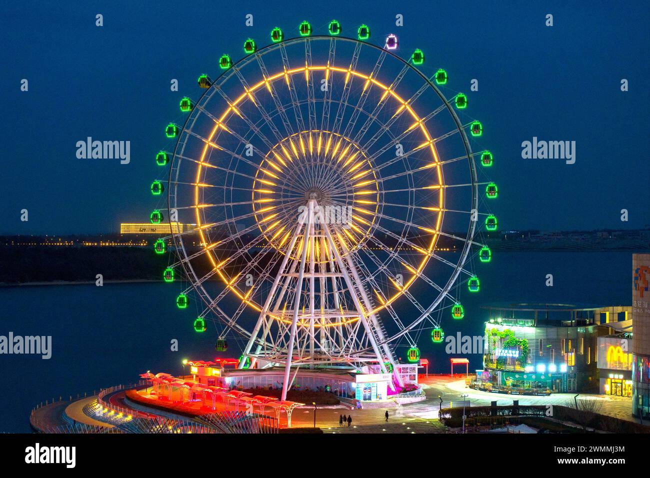 Qingdao, China. 26th Feb, 2024. The ''Eye of Qin Island'' Ferris wheel ...