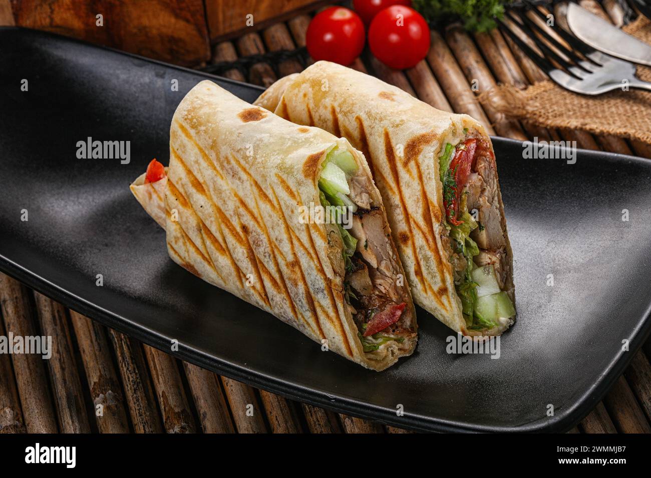 Chicken doner wrap with meat and vegetables Stock Photo - Alamy