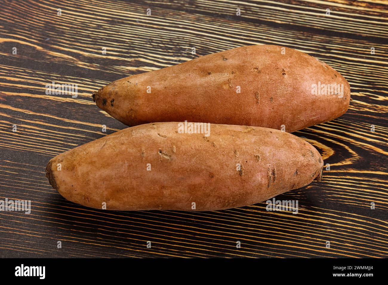 Raw ripe batat root for baked Stock Photo - Alamy