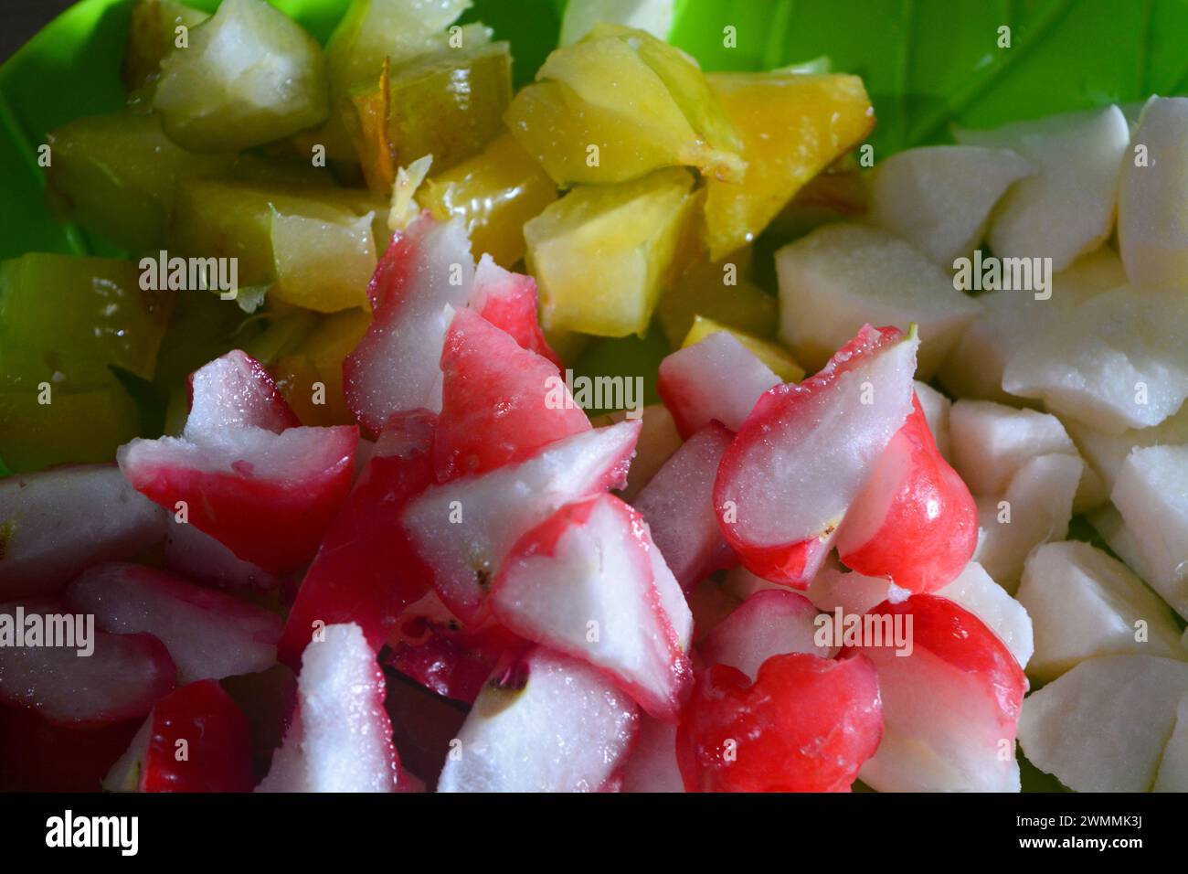Photo of a variety of fruit "Rujak" with sauce made from brown sugar ...