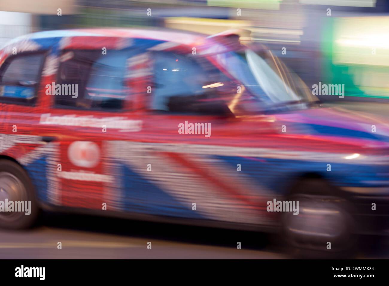London Taxi in Union Flag colours, Piccadilly Circus, London, UK Stock ...